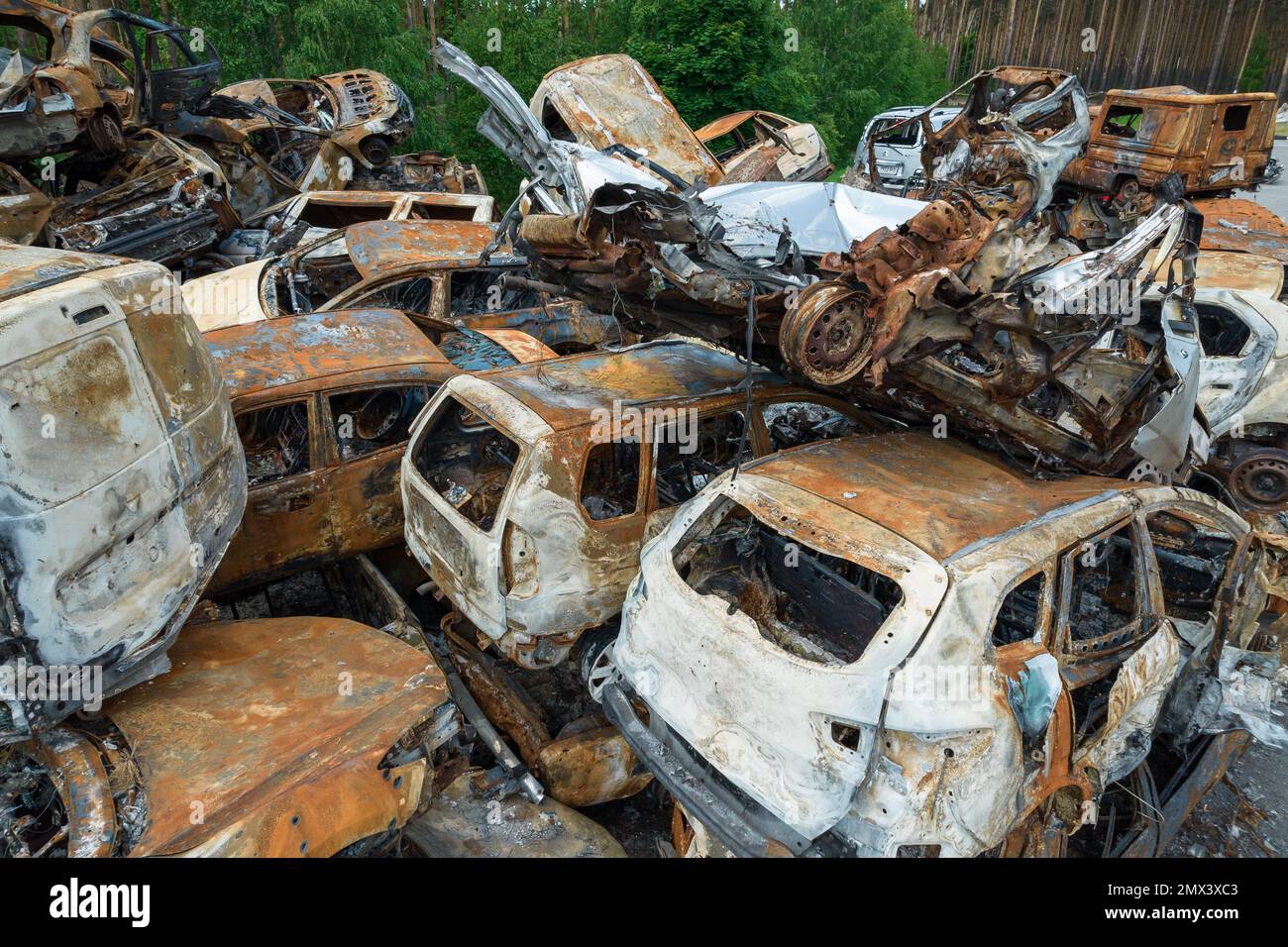 War-destroyed cars in Irpin, Bucha district, Ukraine Stock Photo - Alamy