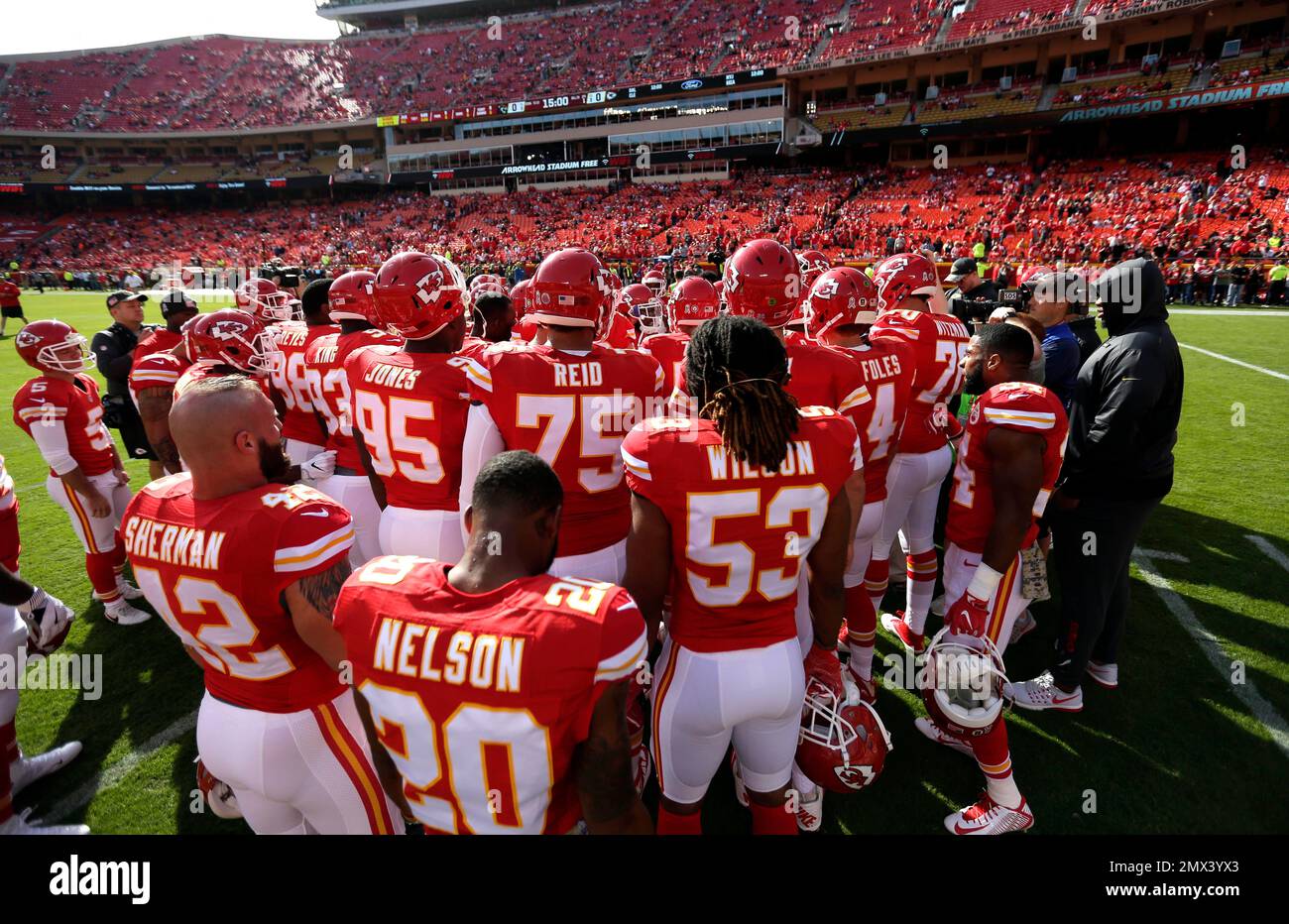 Kansas City Chiefs players gather before an NFL football game against ...