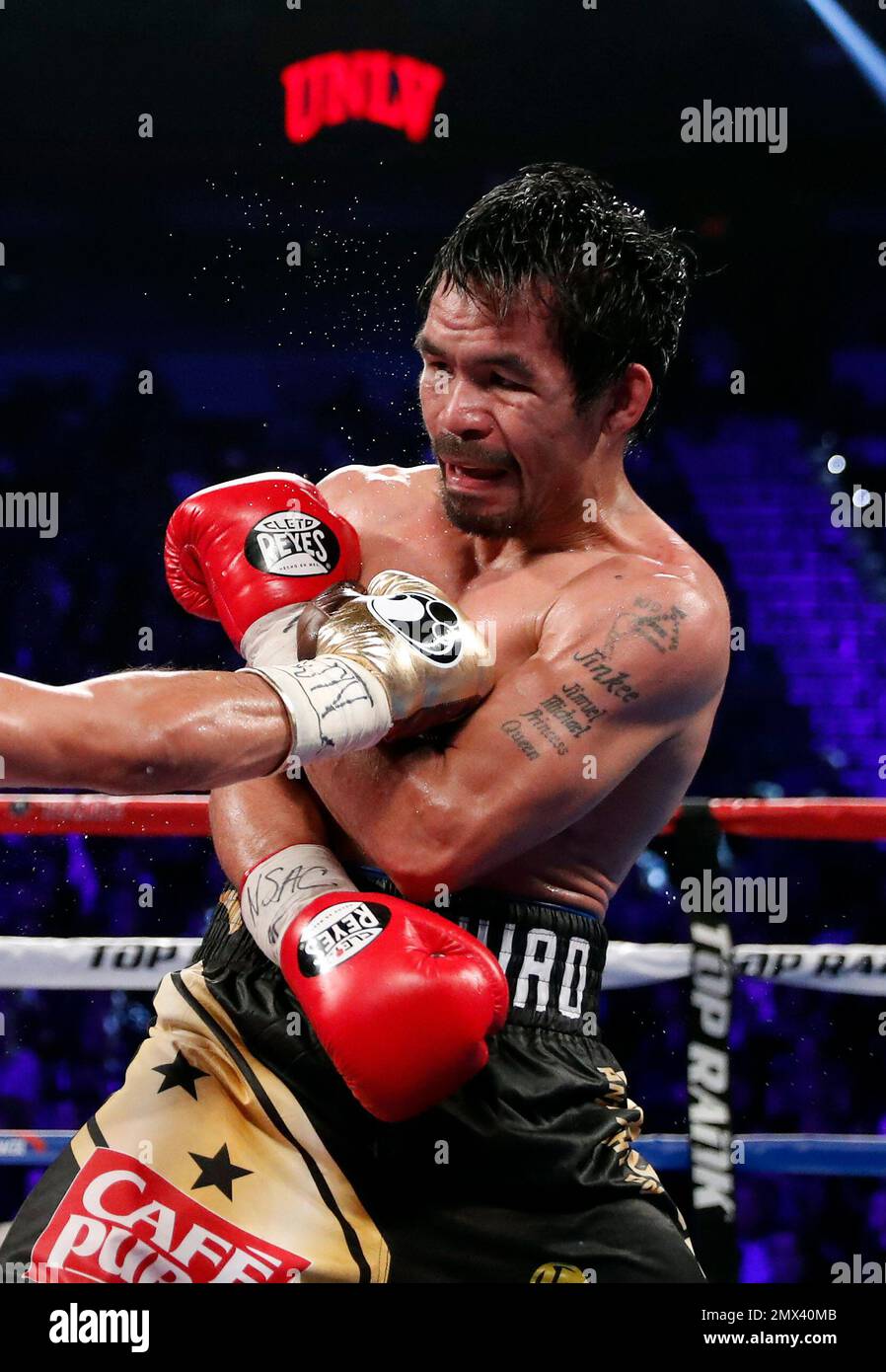Jessie Vargas and Manny Pacquiao, of the Philippines, trade blows ...