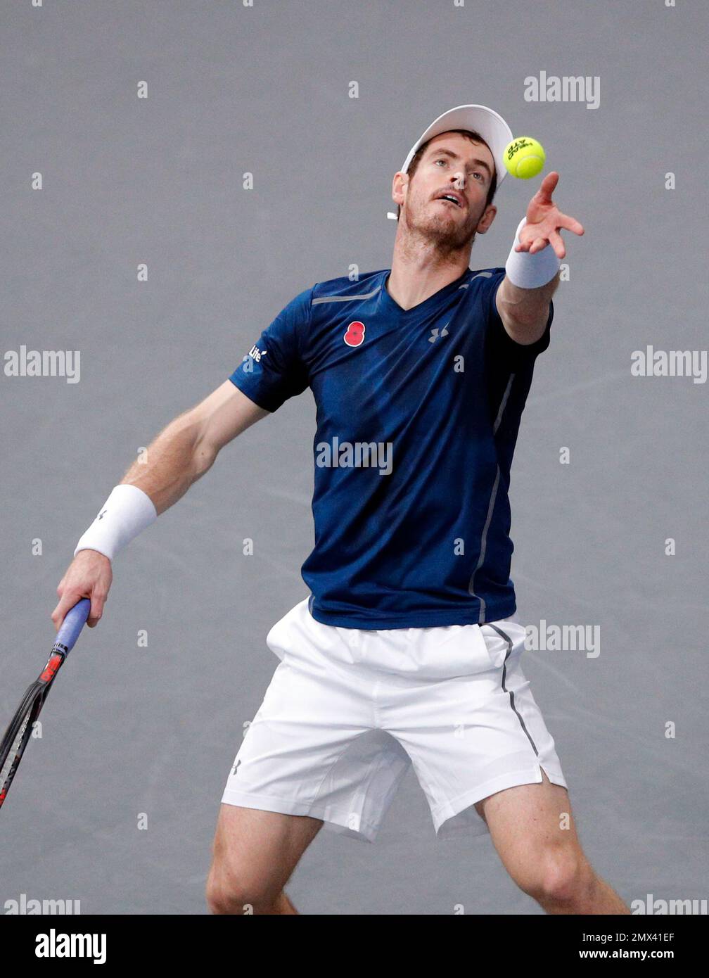 Britain's Andy Murray serves to John Isner of the United States during ...