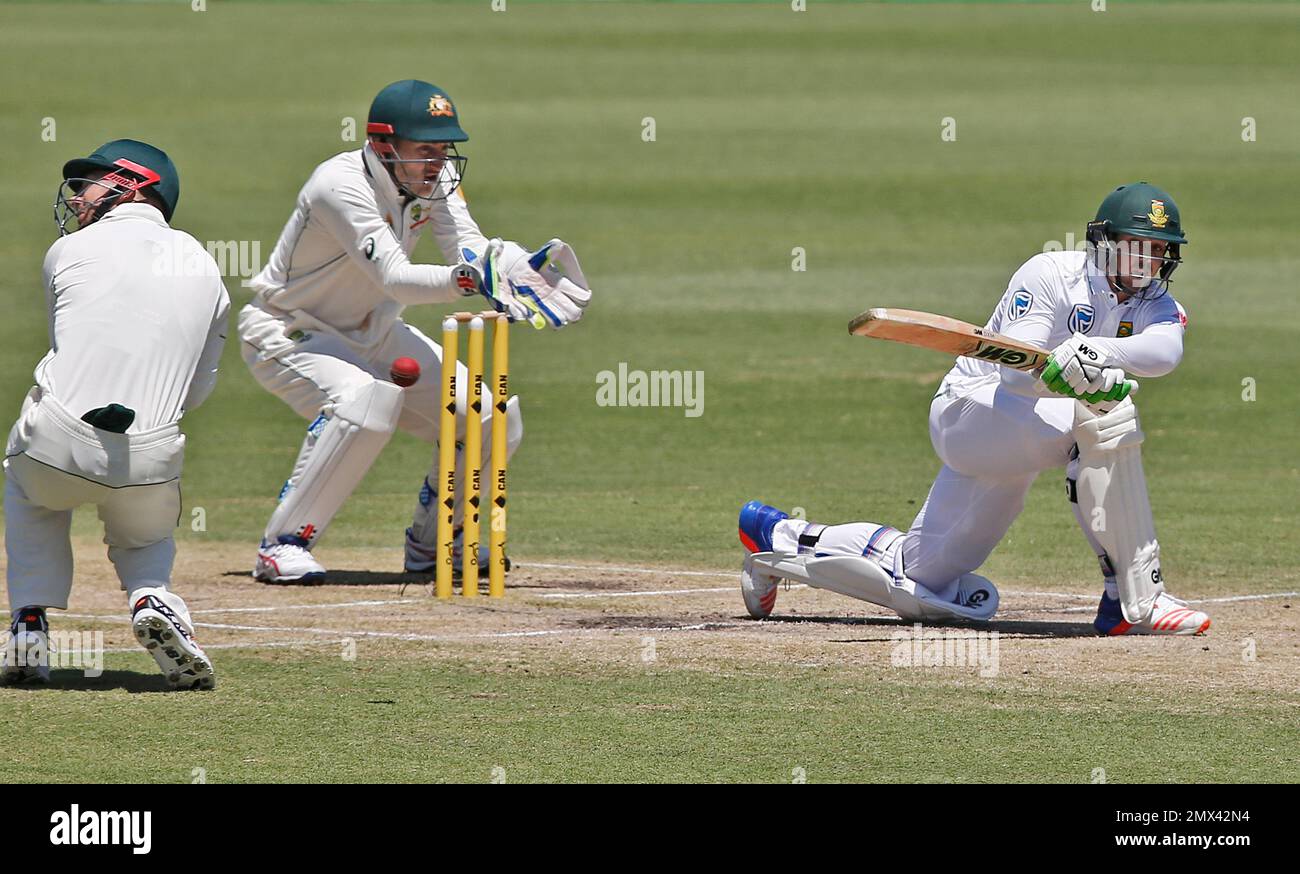 South Africa's Quinton de Kock, right, plays a shot on the fourth day ...