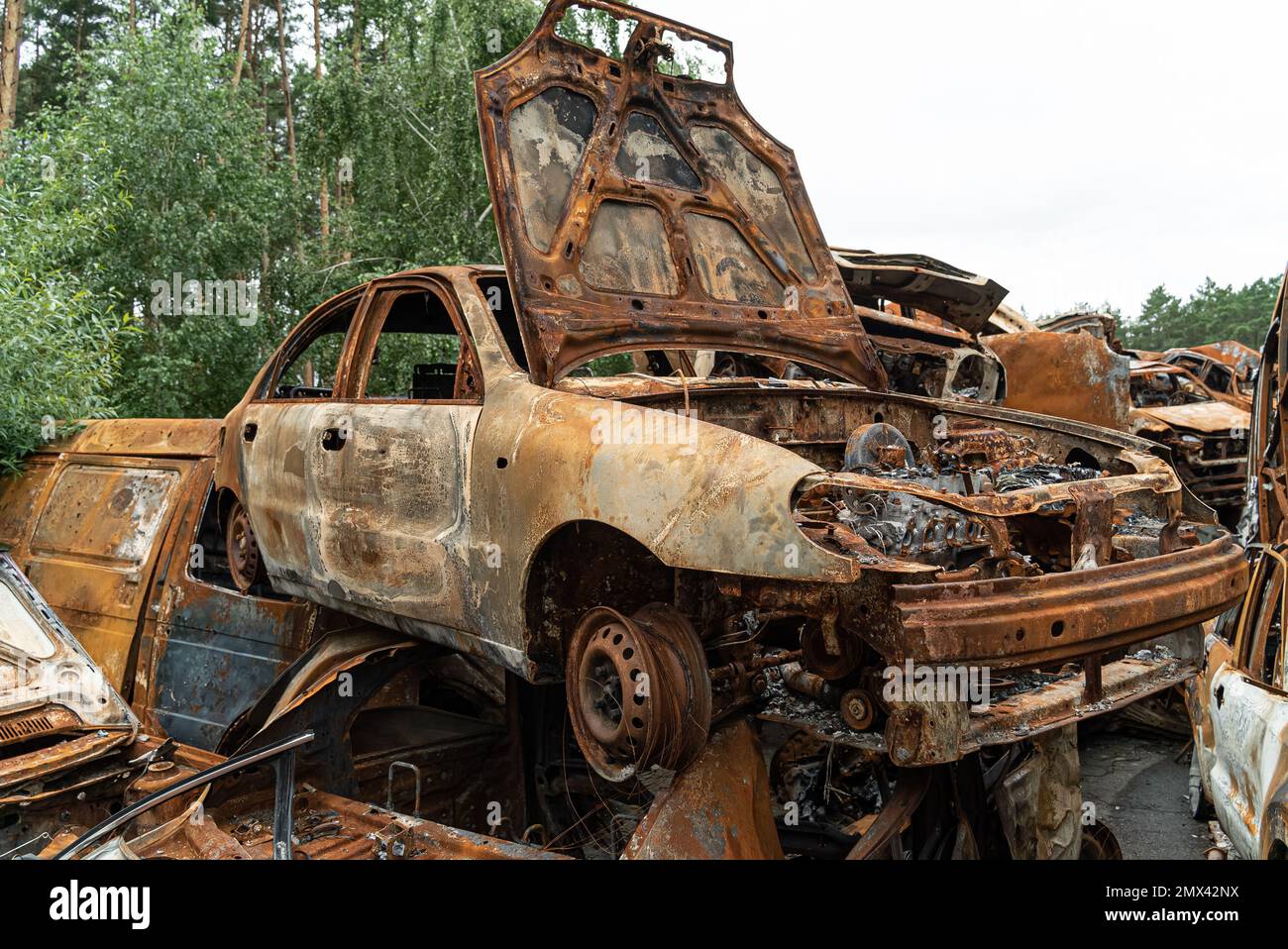 Consequences of the war in Ukraine - destroyed cars in Irpin, Bucha ...