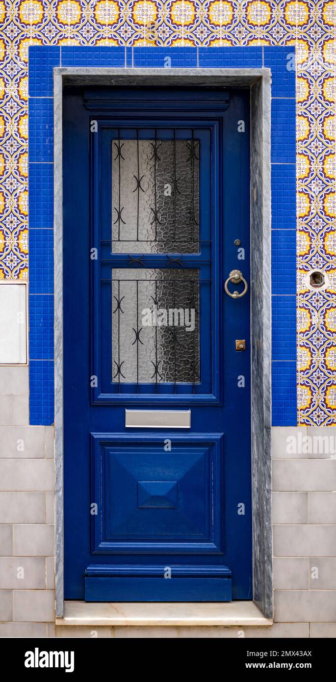 Close view of beautiful details of typical doors and azulejo tiles ...