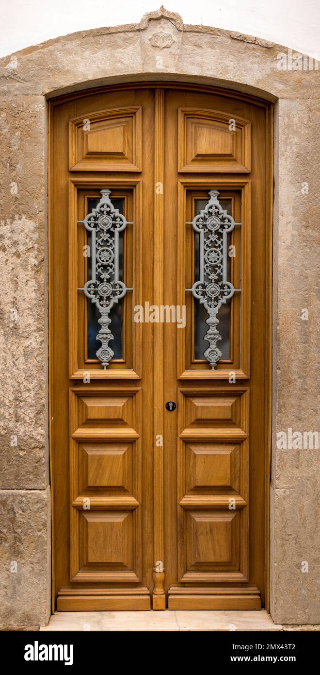 Close view of beautiful details of typical doors and azulejo tiles ...