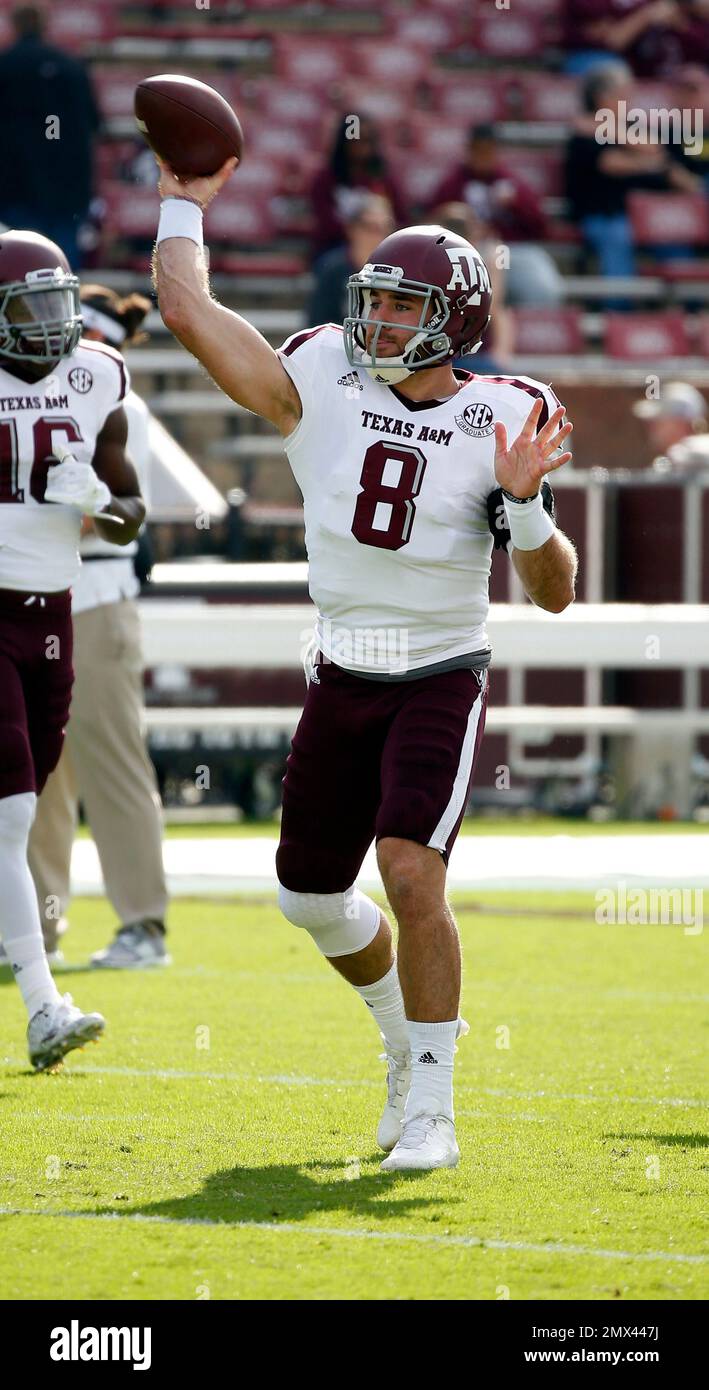 Texas A&M quarterback Trevor Knight (8) tosses pre game passes prior to ...