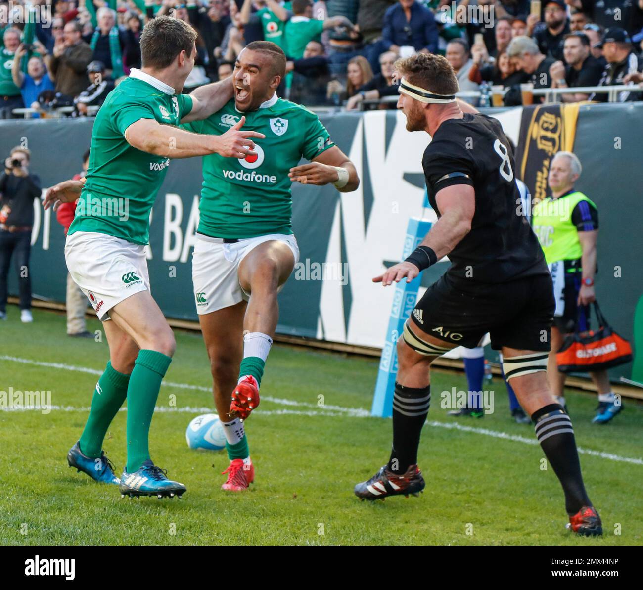 Ireland's Simon Zebo, center, celebrates with Johnny Sexton, left ...