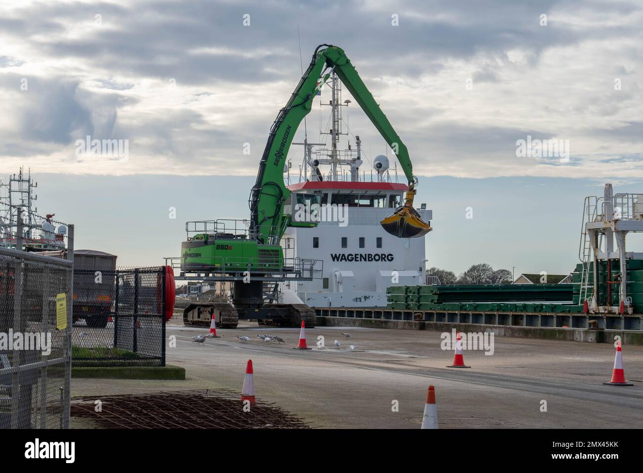 Unloading grain cargo from a ship named Hydra in harbour Stock Photo ...