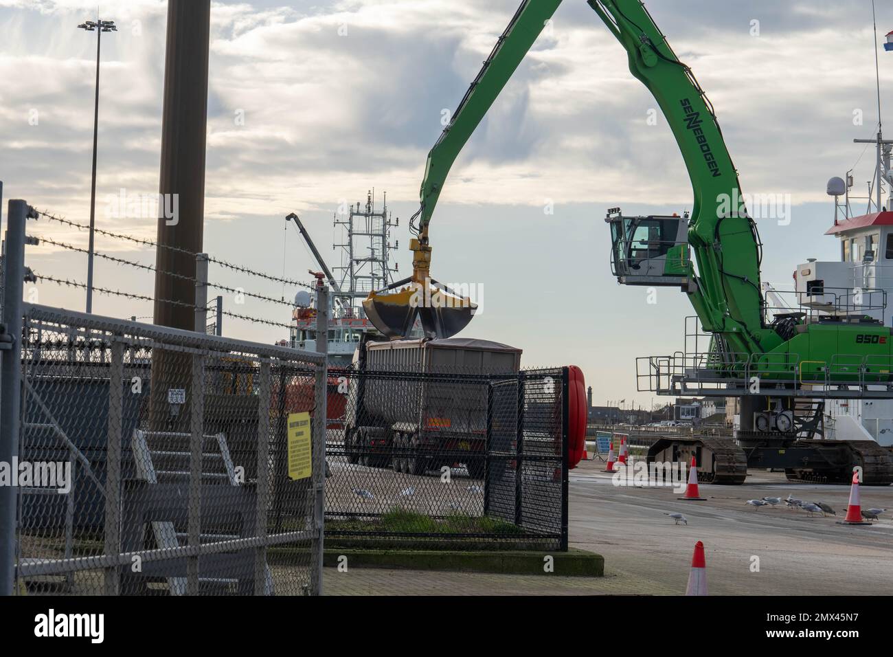 Unloading grain cargo from a ship named Hydra in harbour Stock Photo ...