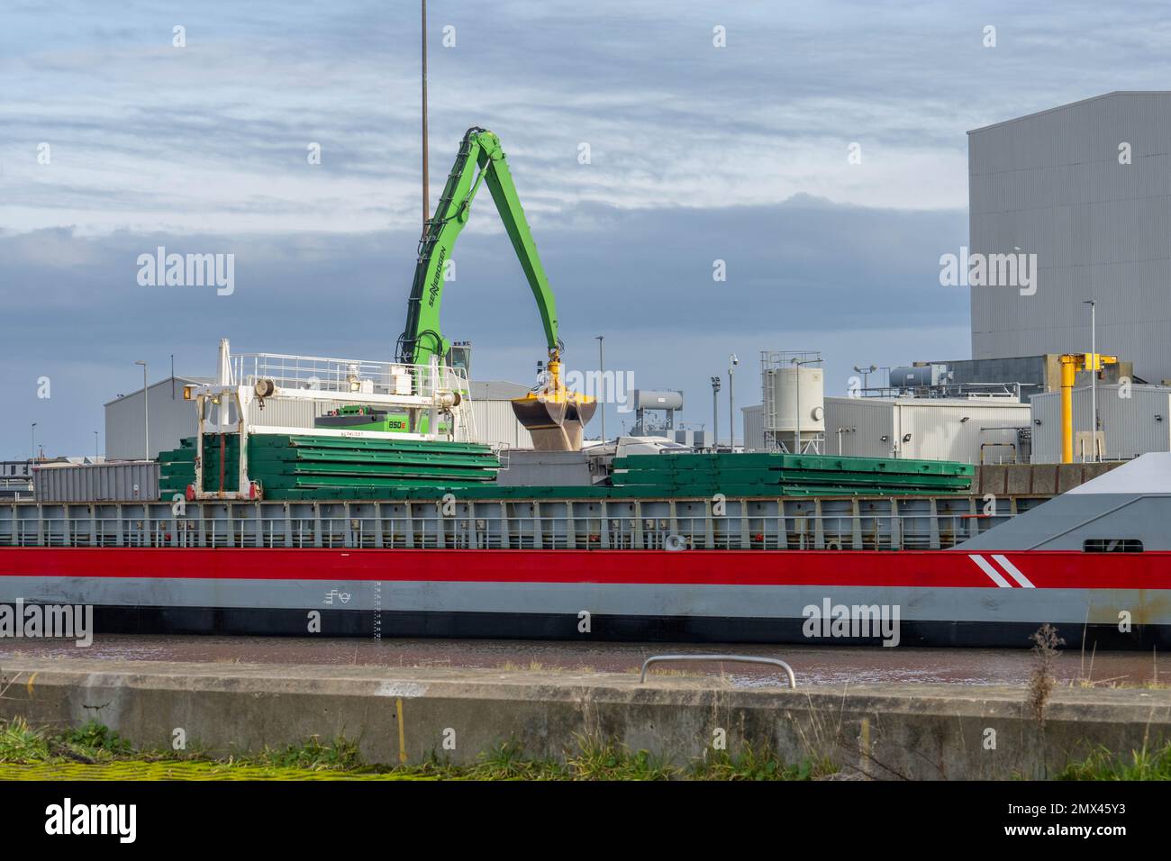 Unloading grain cargo from a ship named Hydra in harbour Stock Photo ...
