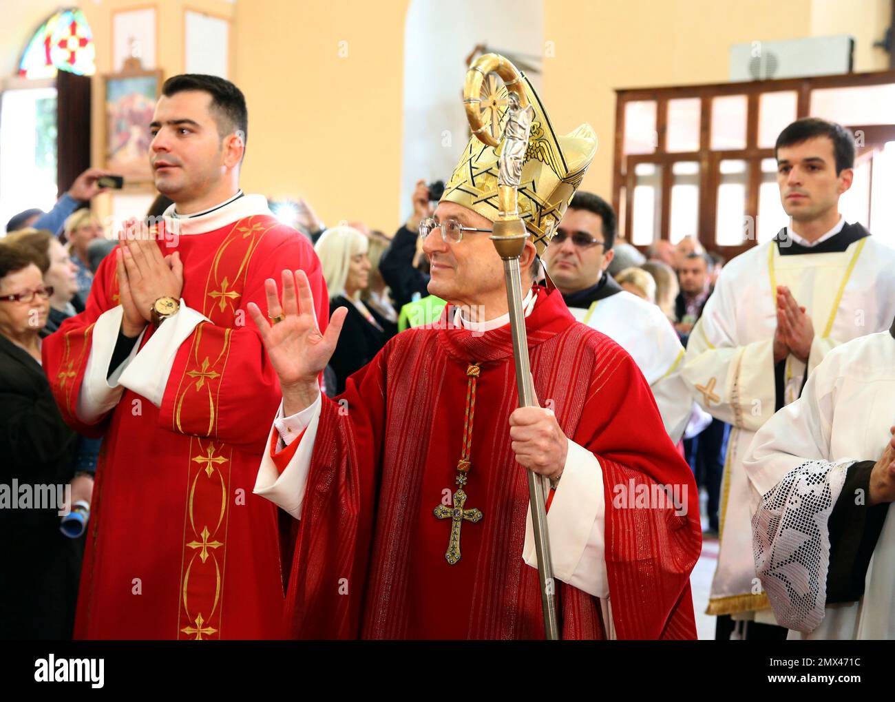 Cardinal Angelo Amato, the pope's representative, enters the cathedral ...