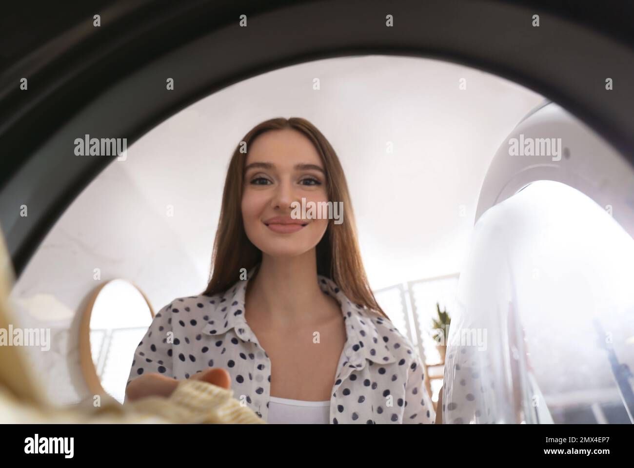 Woman inside washing machine hi-res stock photography and images - Alamy