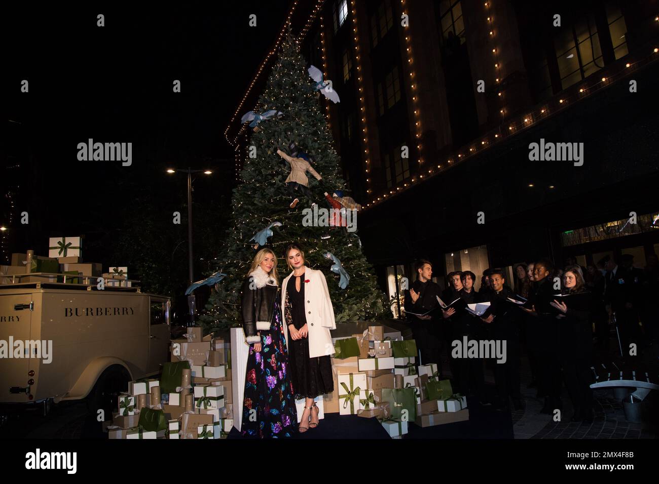 Harrods Chief Merchant Helen David and actress Lily James pose for ...