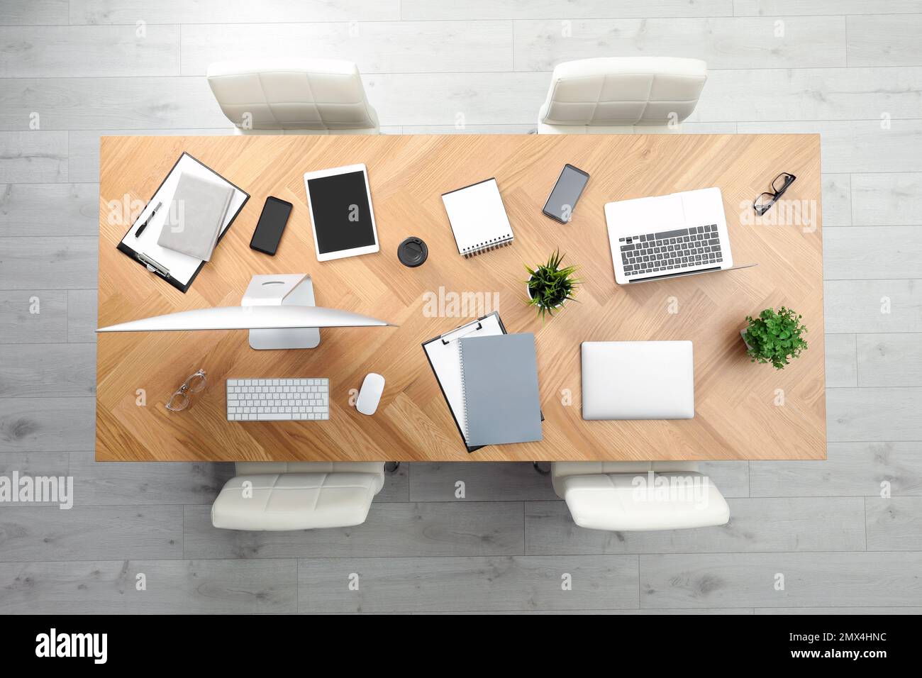 Modern office table with devices and chairs, top view Stock Photo - Alamy