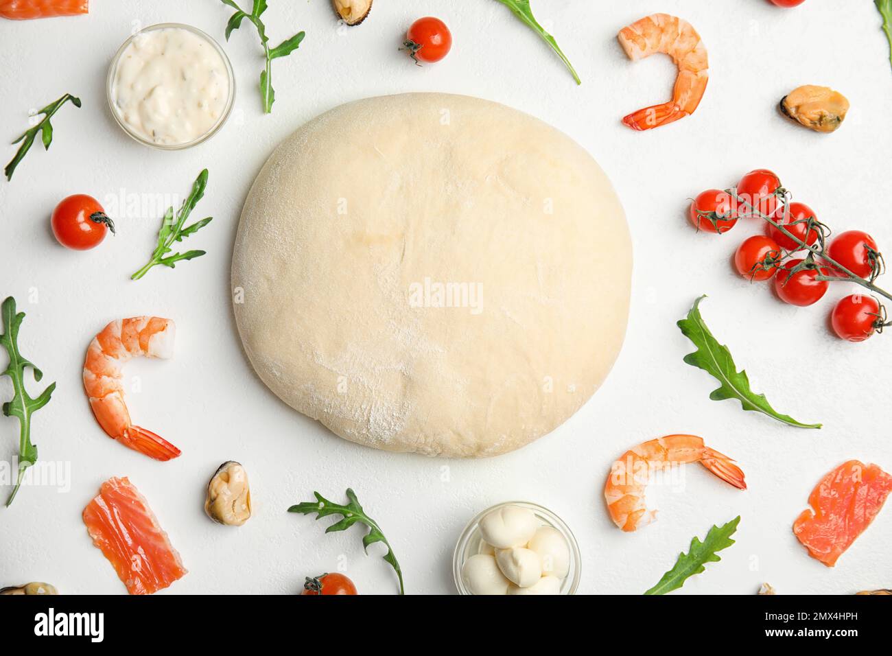 Flat lay composition with dough and fresh ingredients for seafood pizza ...