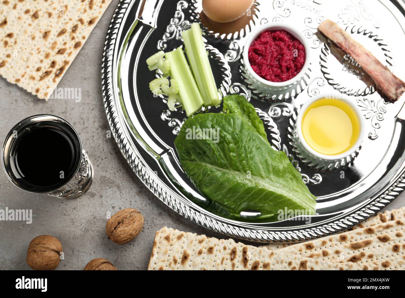 Flat lay composition with Passover Seder plate (keara) on grey table ...