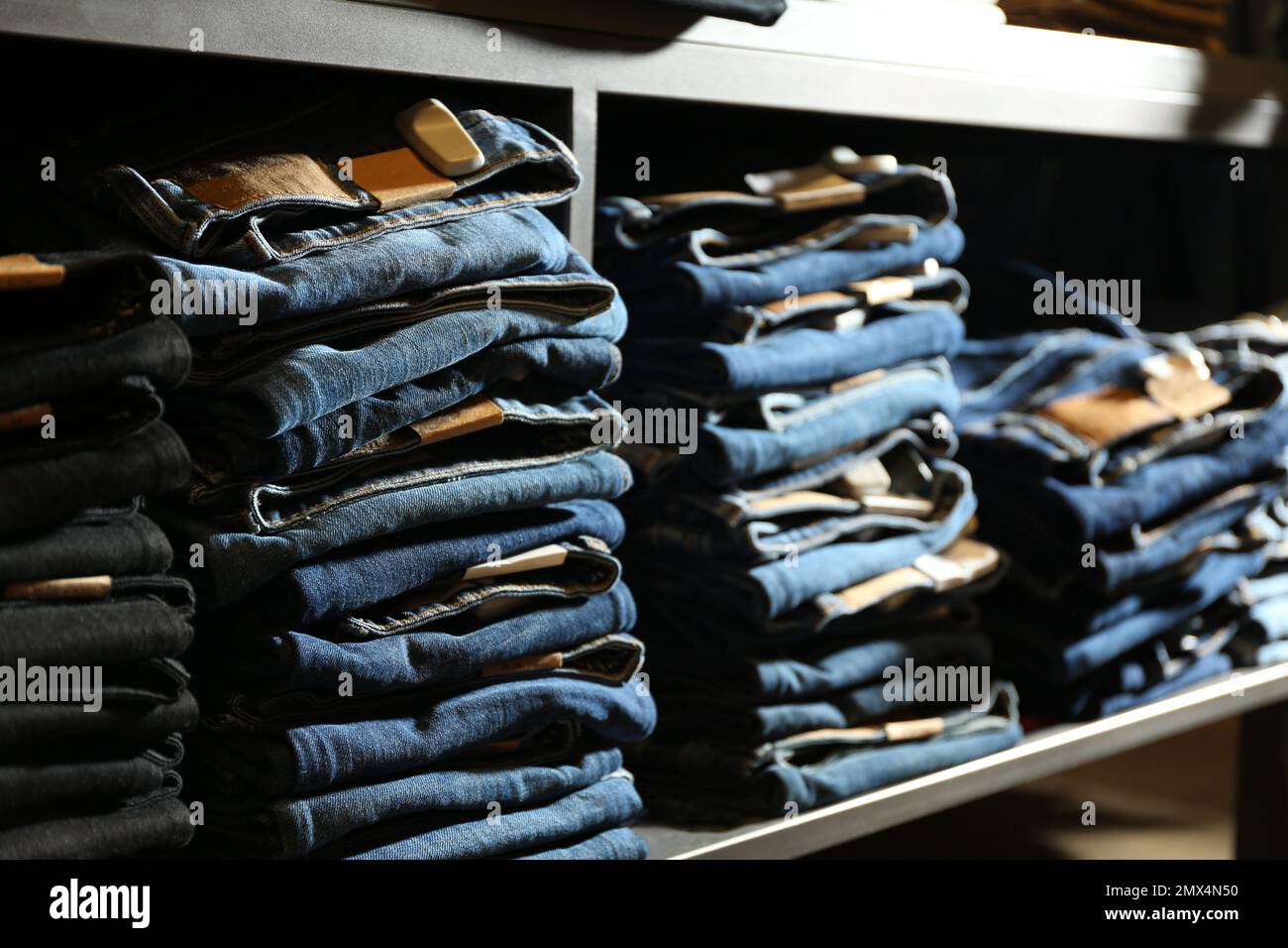 Jeans on shelf hi-res stock photography and images - Alamy