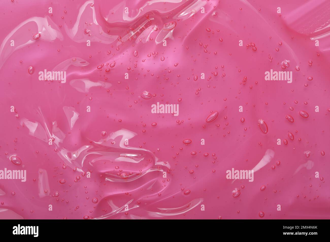 Pure transparent cosmetic gel on pink background, closeup Stock Photo ...