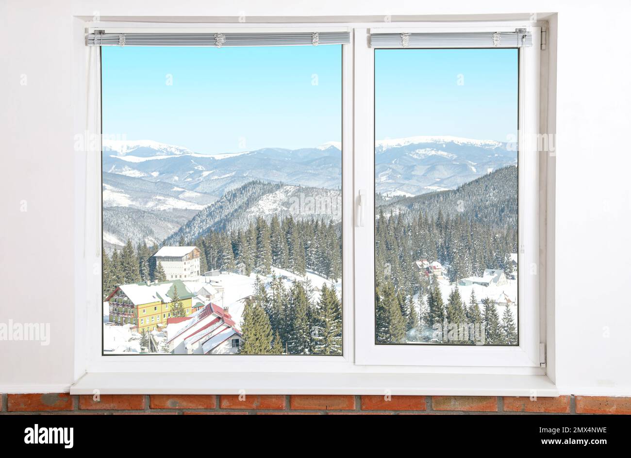 Beautiful view of snowy forest through big window Stock Photo - Alamy
