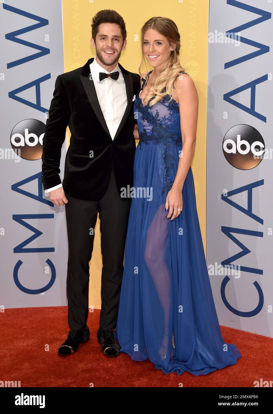 Thomas Rhett, left, and Lauren Gregory arrive at the 50th annual CMA ...