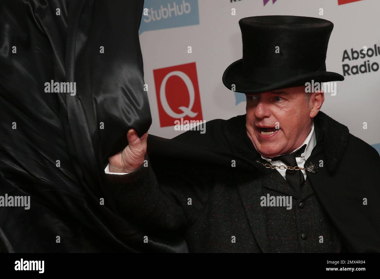 Suggs of Madness poses for photographers upon arrival for the Q Music ...