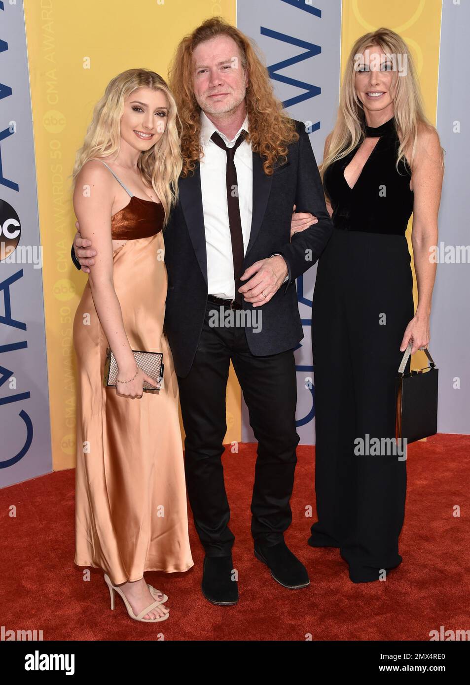 Electra Mustaine, from left, Dave Mustaine and Pamela Anne Casselberry ...
