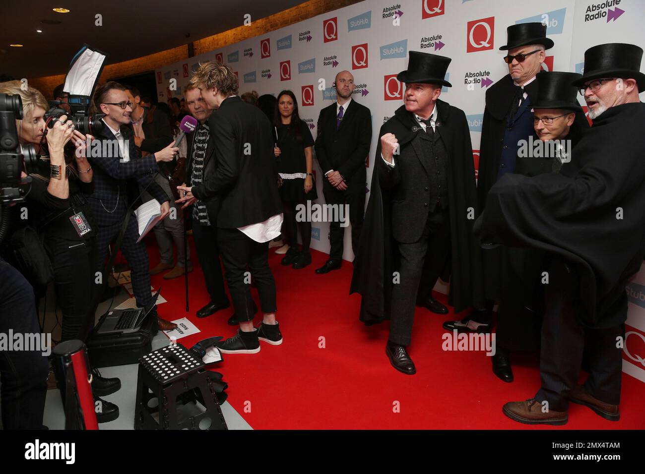 British band Madness pose for photographers upon arrival for the Q ...