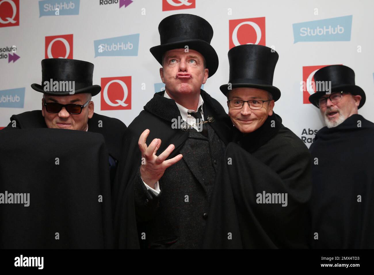British band Madness pose for photographers upon arrival for the Q ...