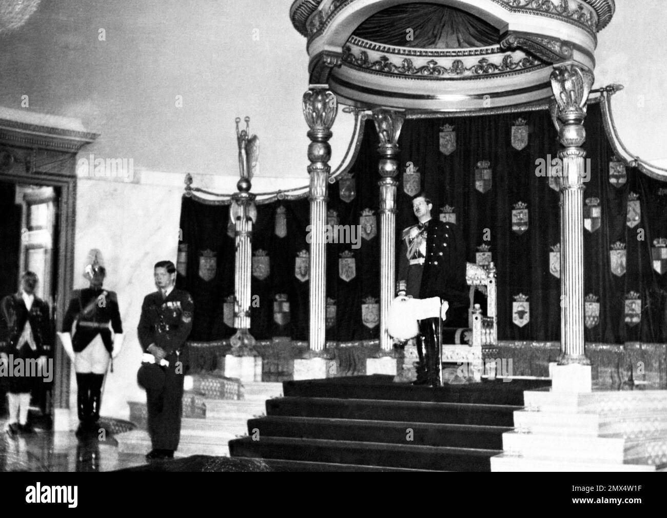 King Carol of Romania speaking from his throne in the palace in ...