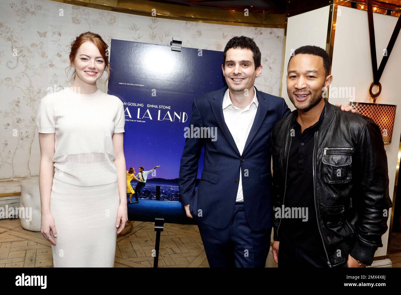 Emma Stone, Director/Writer Damien Chazelle and John Legend seen at a ...