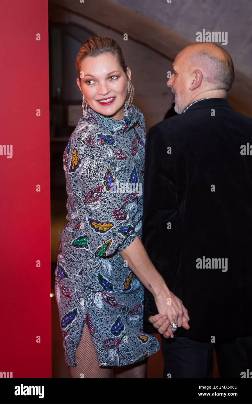 Model Kate Moss poses for photographers upon arrival at the Sam ...