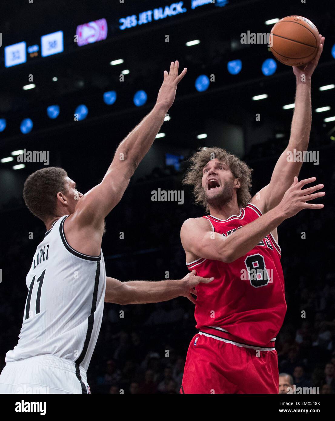 Chicago Bulls center Robin Lopez (8) goes to the basket against ...