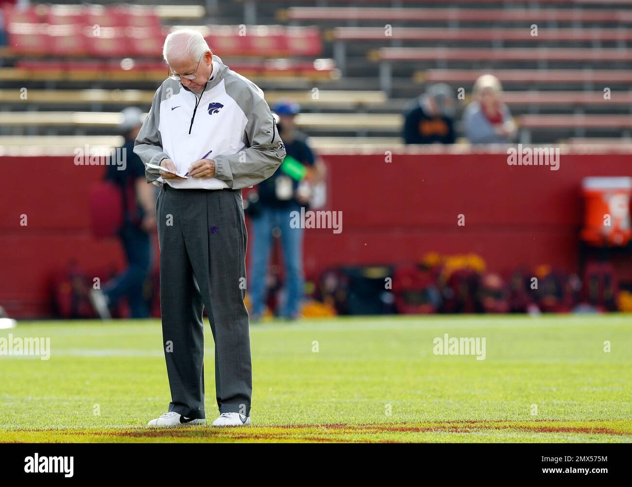 Kansas State head coach Bill Snyder stands on the field before an NCAA ...
