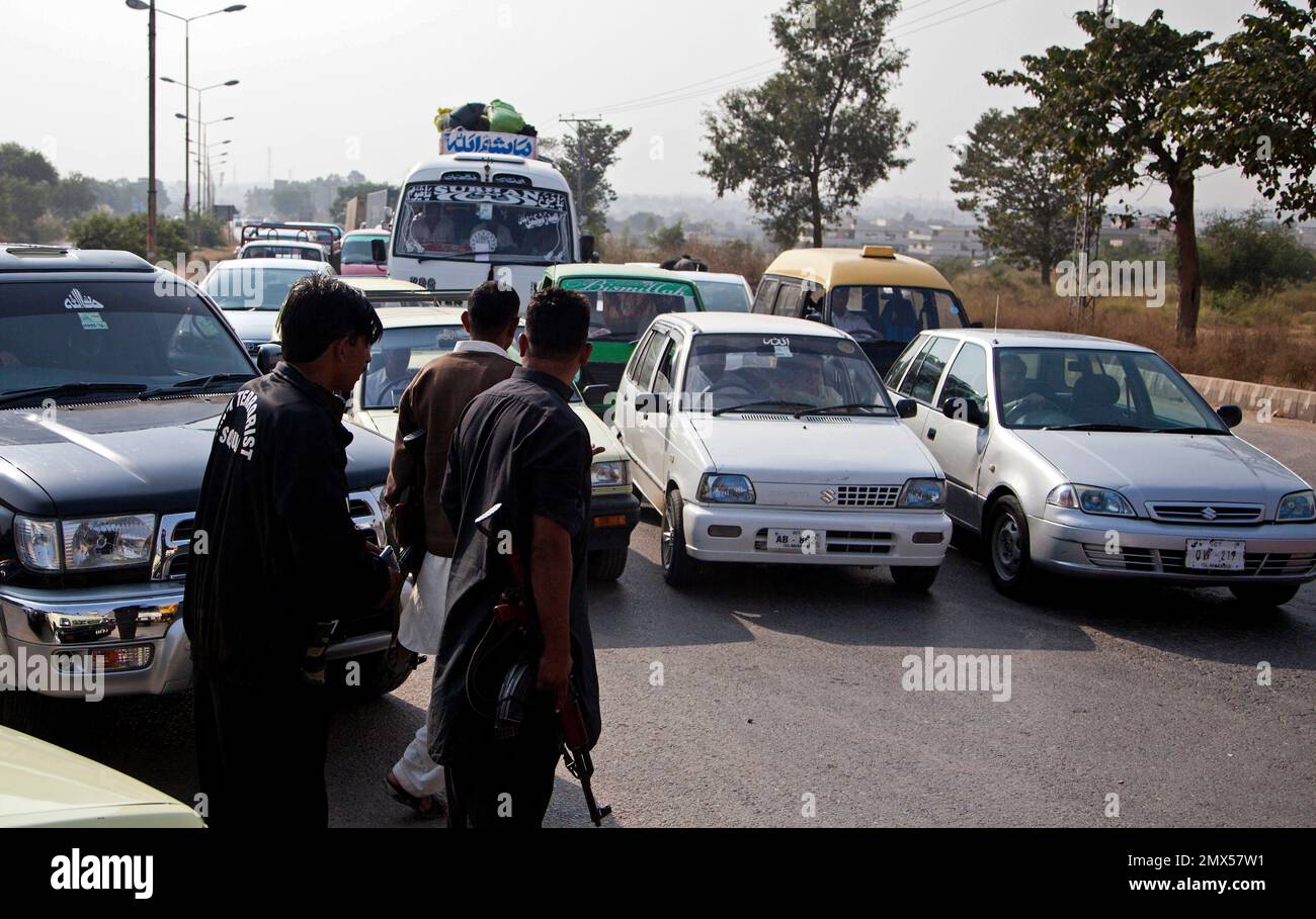 Pakistani security forces check vehicles entering Islamabad, Pakistan ...