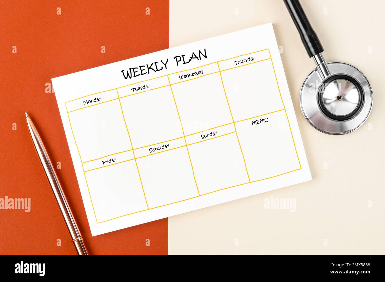 Blank weekly plan notice block and medical stethoscope on beautiful ...