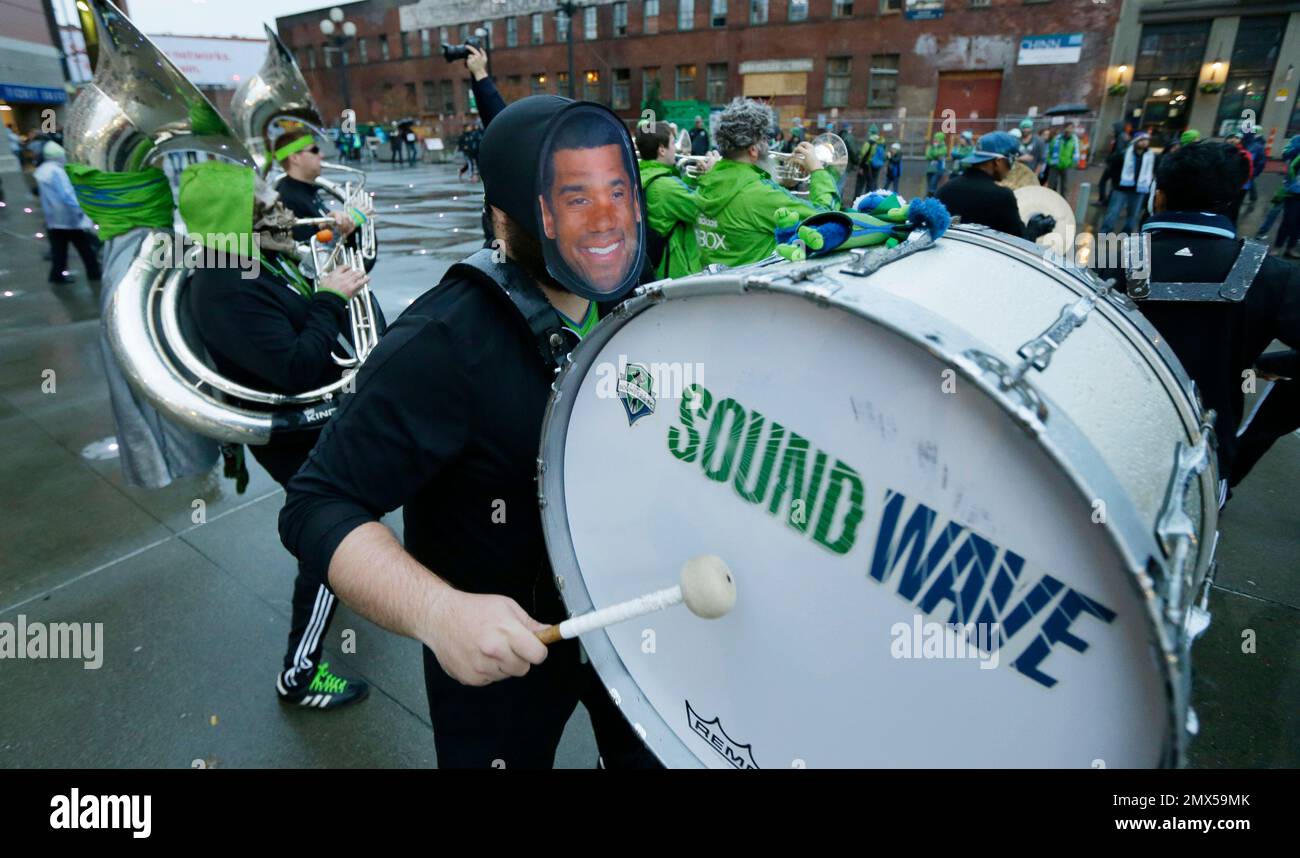 A member of Sound Wave, the official band of the Seattle Sounders ...