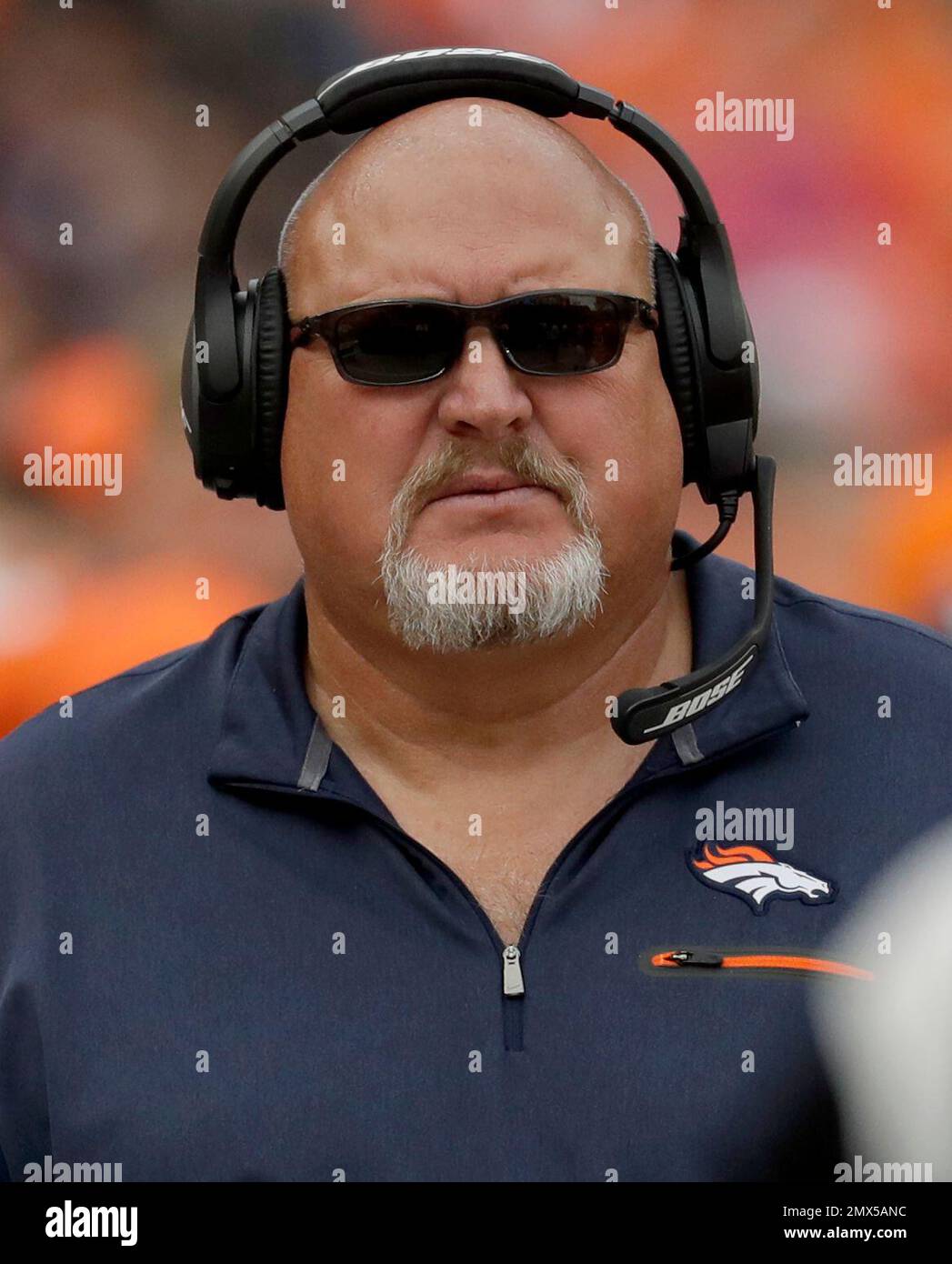 Denver Broncos Reggie Herring walks the sidelines during the second ...