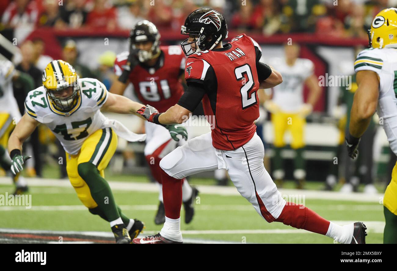 Atlanta Falcons quarterback Matt Ryan (2) runs out of the pocket as ...