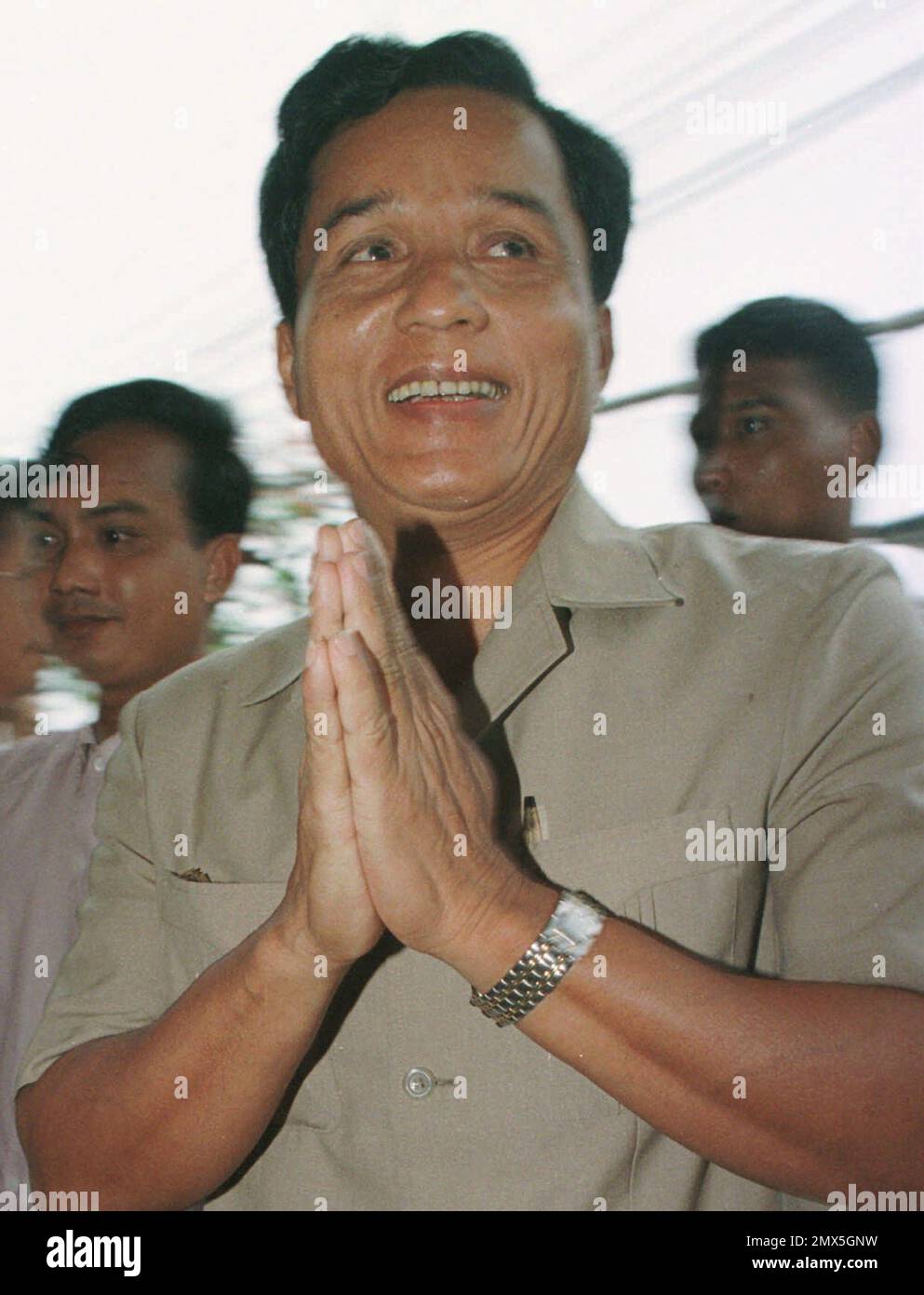 FILE - In this April 23, 1997 file photo, Pen Sovann arrives at a news conference in Phnom Penh ...