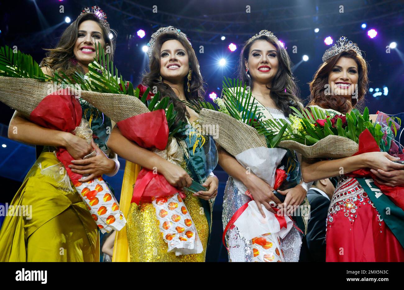 Winners for the Miss Earth 2016 pose for photographers following the ...