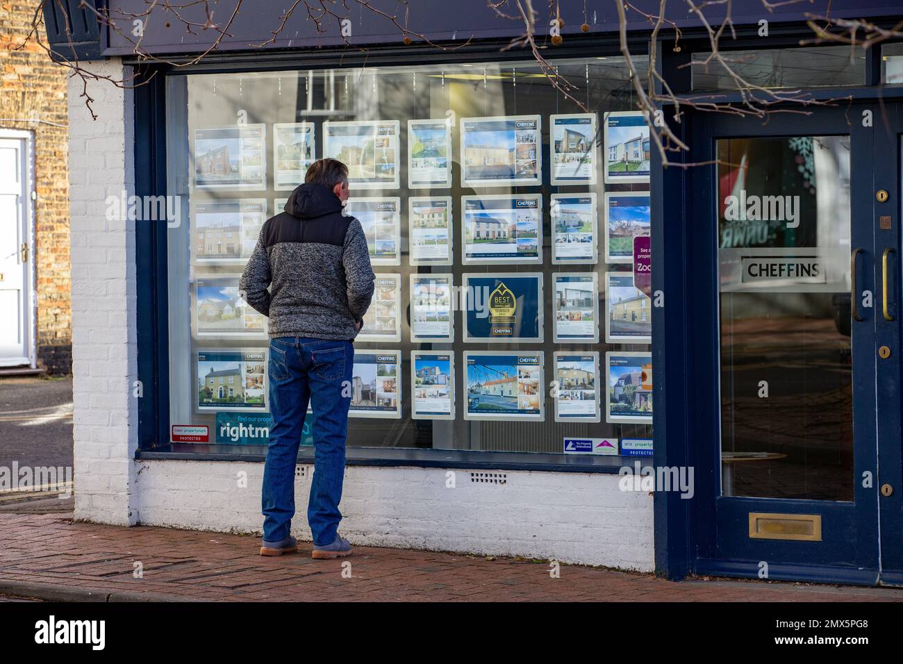 Picture dated February 2nd shows people looking in estate agents ...