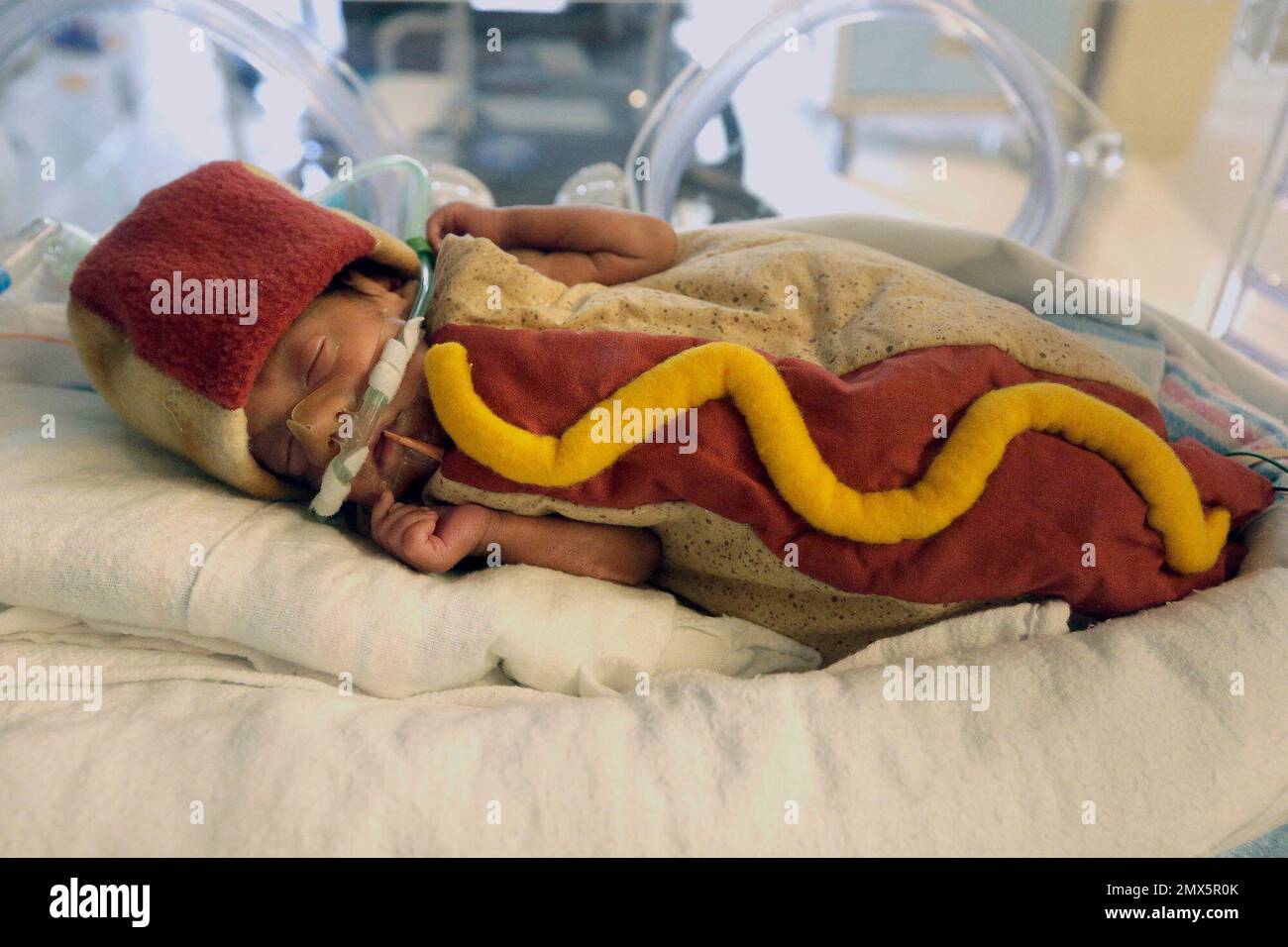 Baby Yuni Segura is dressed in a hot dog costume at Cedars-Sinai ...