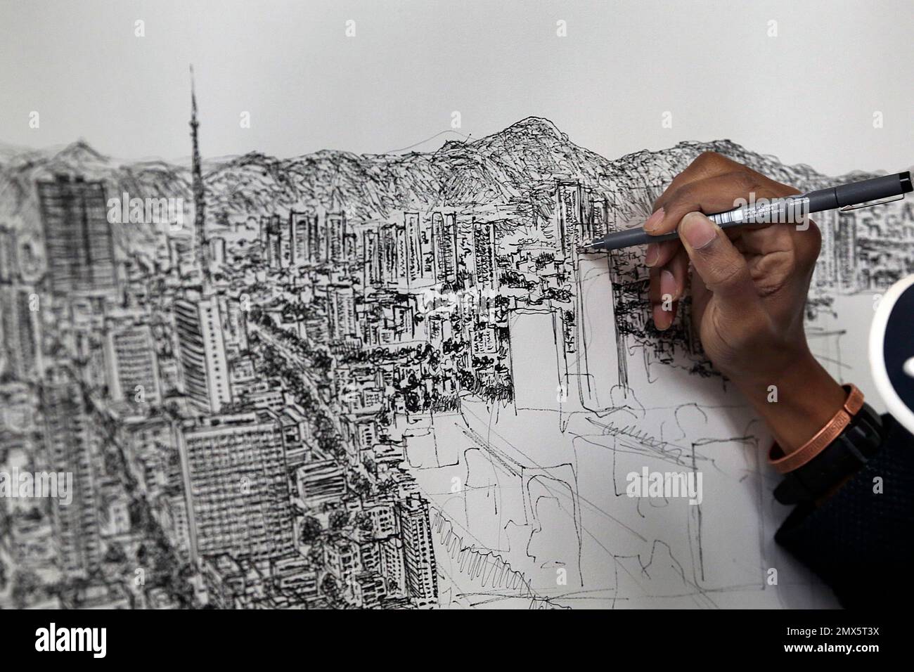 British artist Stephen Wiltshire draws Mexico City from memory, in the ...