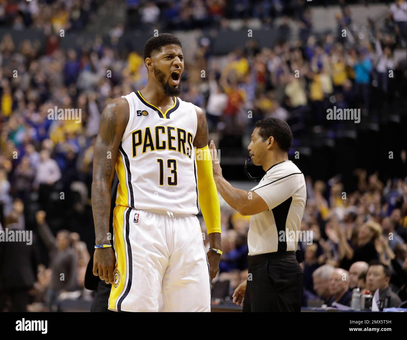 Indiana Pacers' Paul George (13) reacts during overtime of an NBA ...