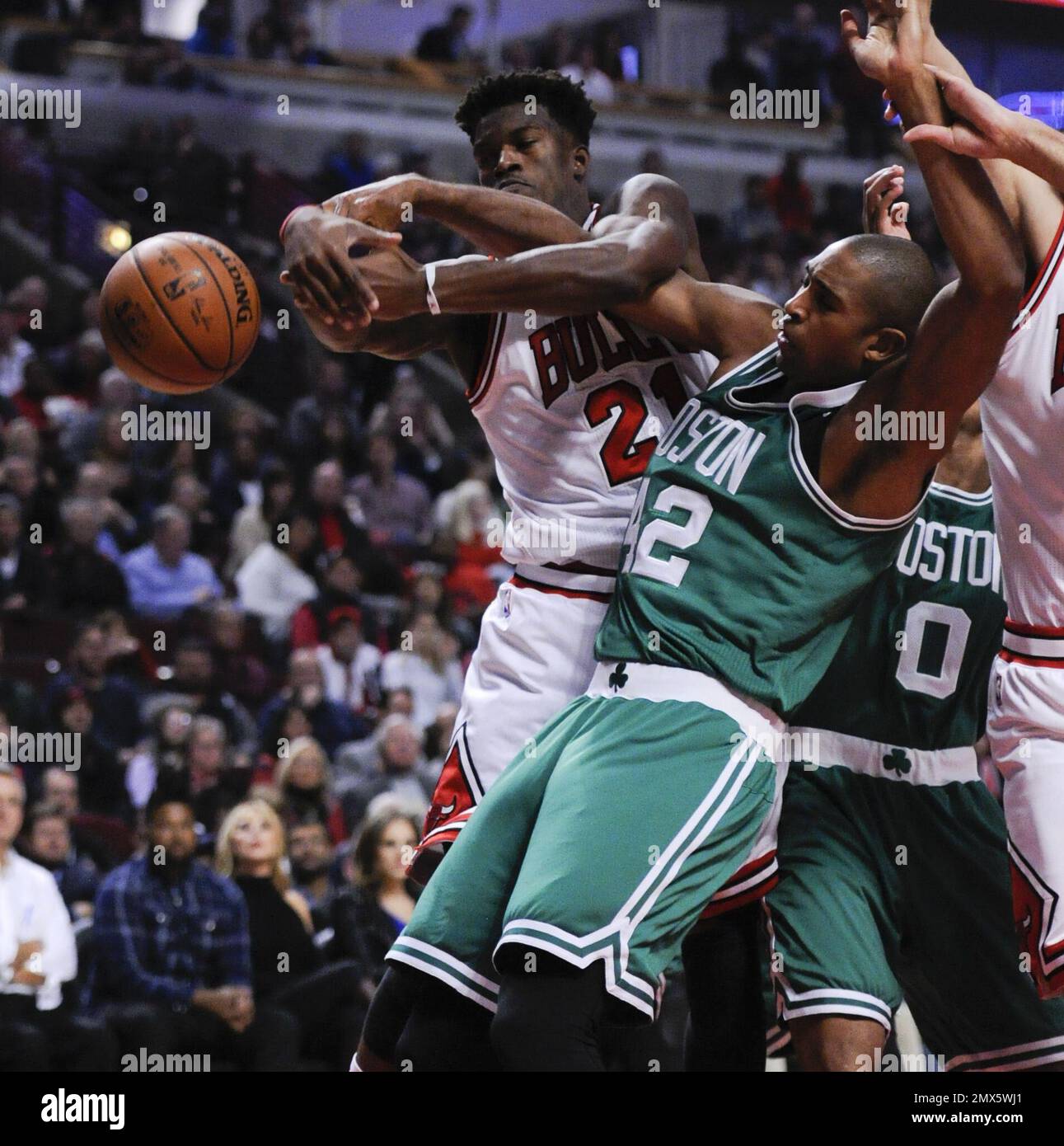 Chicago Bulls' Jimmy Butler (21) and Boston Celtics' Al Horford, right ...