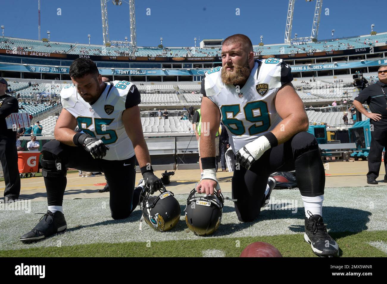 Jacksonville Jaguars center Brandon Linder (65) and center Tyler ...
