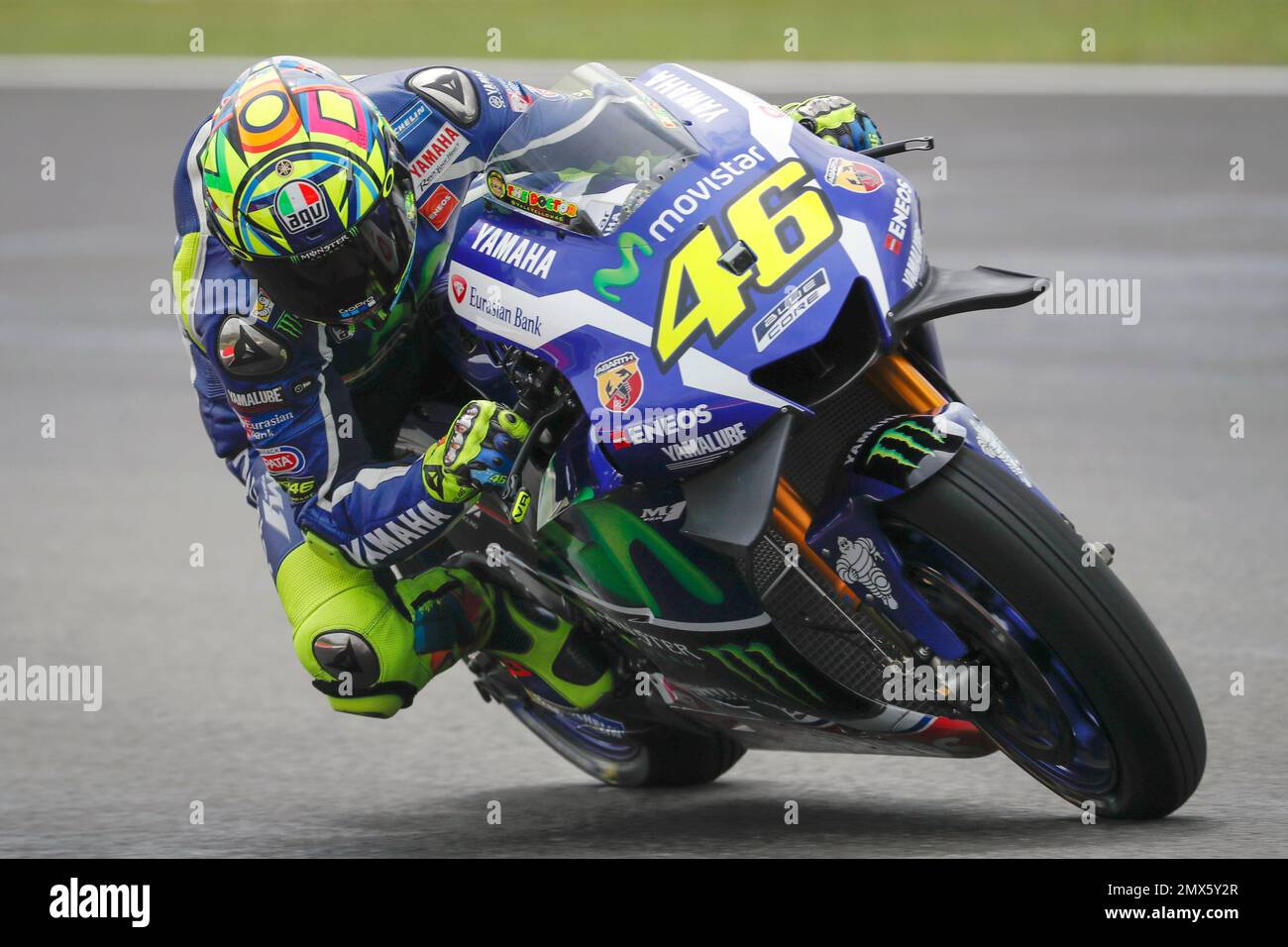 Yamaha MotoGP rider Valentino Rossi of Italy controls his bike on turn ...
