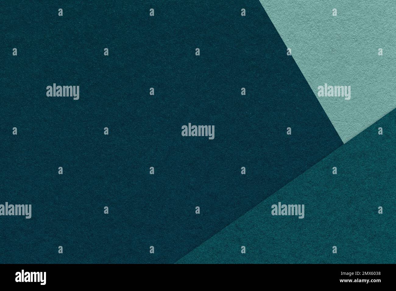Texture of craft dark emerald color paper background with cyan and teal ...