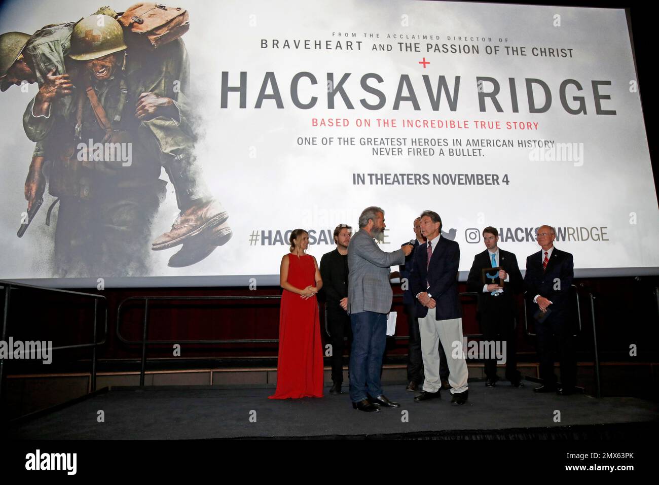 Director Mel Gibson, center, interviews Desmond Doss Jr., the son of ...