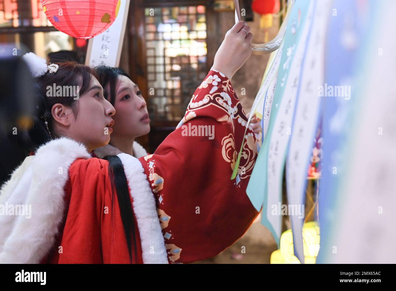 Huzhou, China's Zhejiang Province. 2nd Feb, 2023. Girls in traditional ...