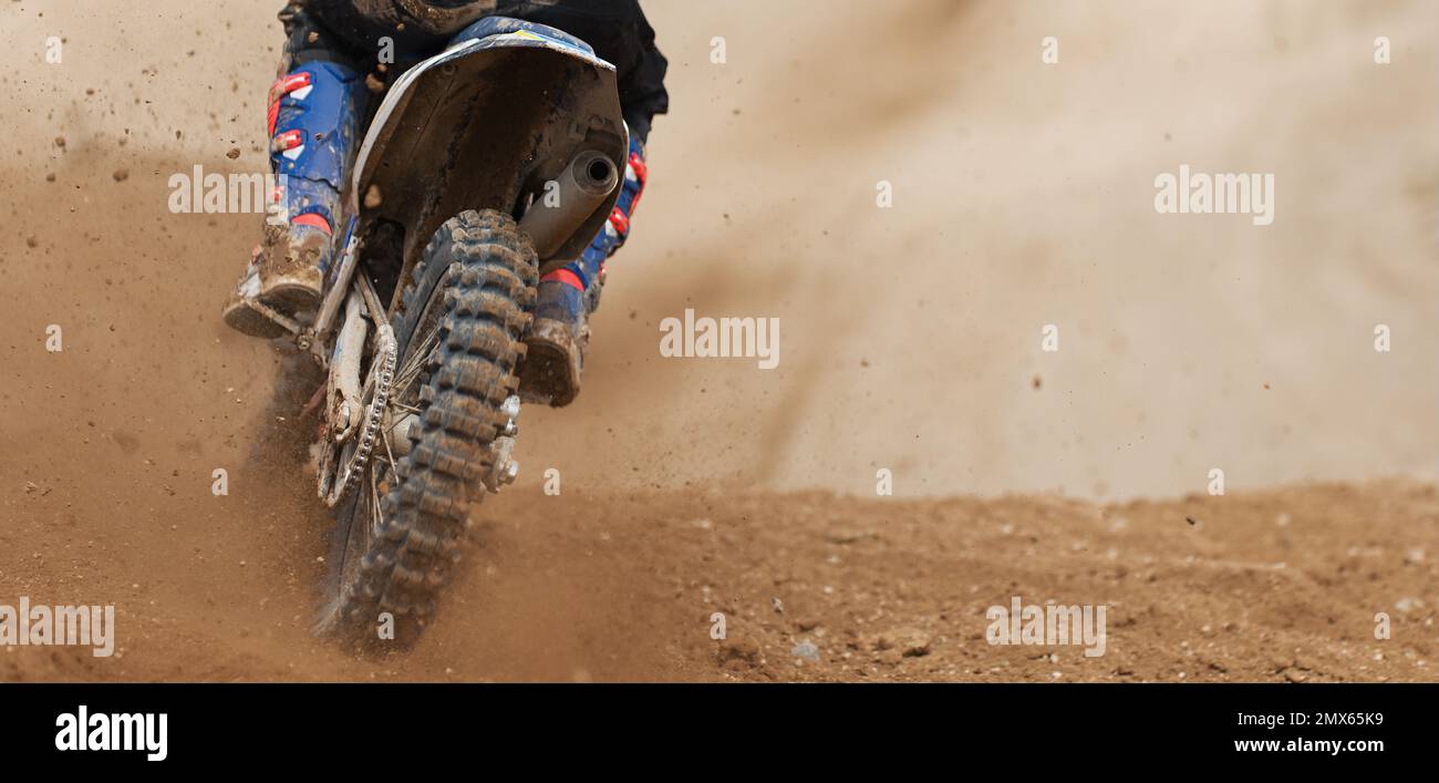 Motocross racer accelerating in dirt track hi-res stock photography and ...